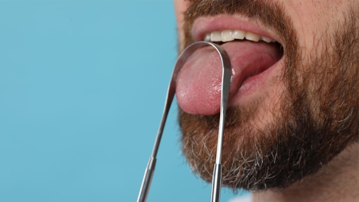 Yes, you do need to clean your tongue. Here’s how and why | YourLifeChoices