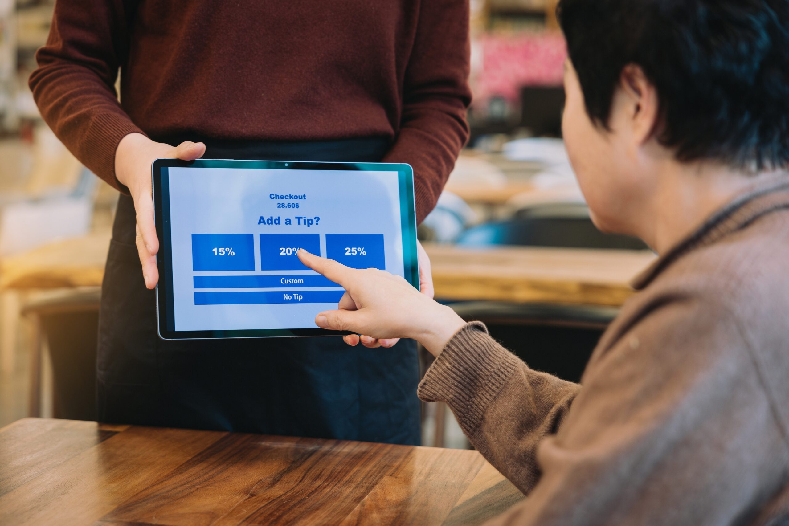 Is tipping culture creeping in? Australian backlash over US-style ...