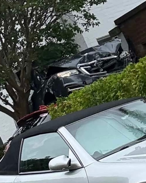 A freak accident has everyone asking: How did this car get up there ...